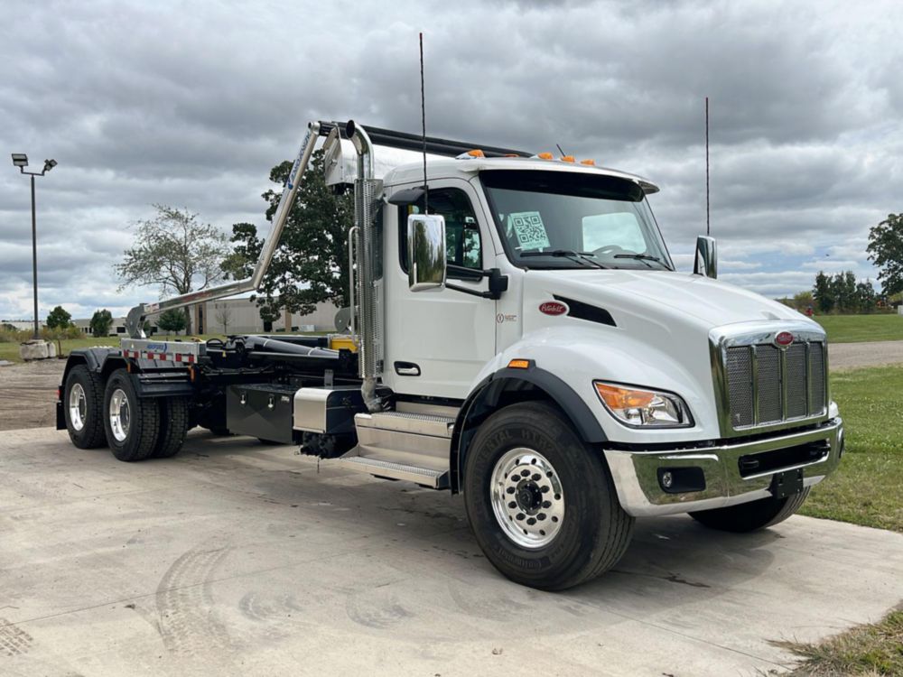 Hooklift Truck Rental - Custom Truck One Source