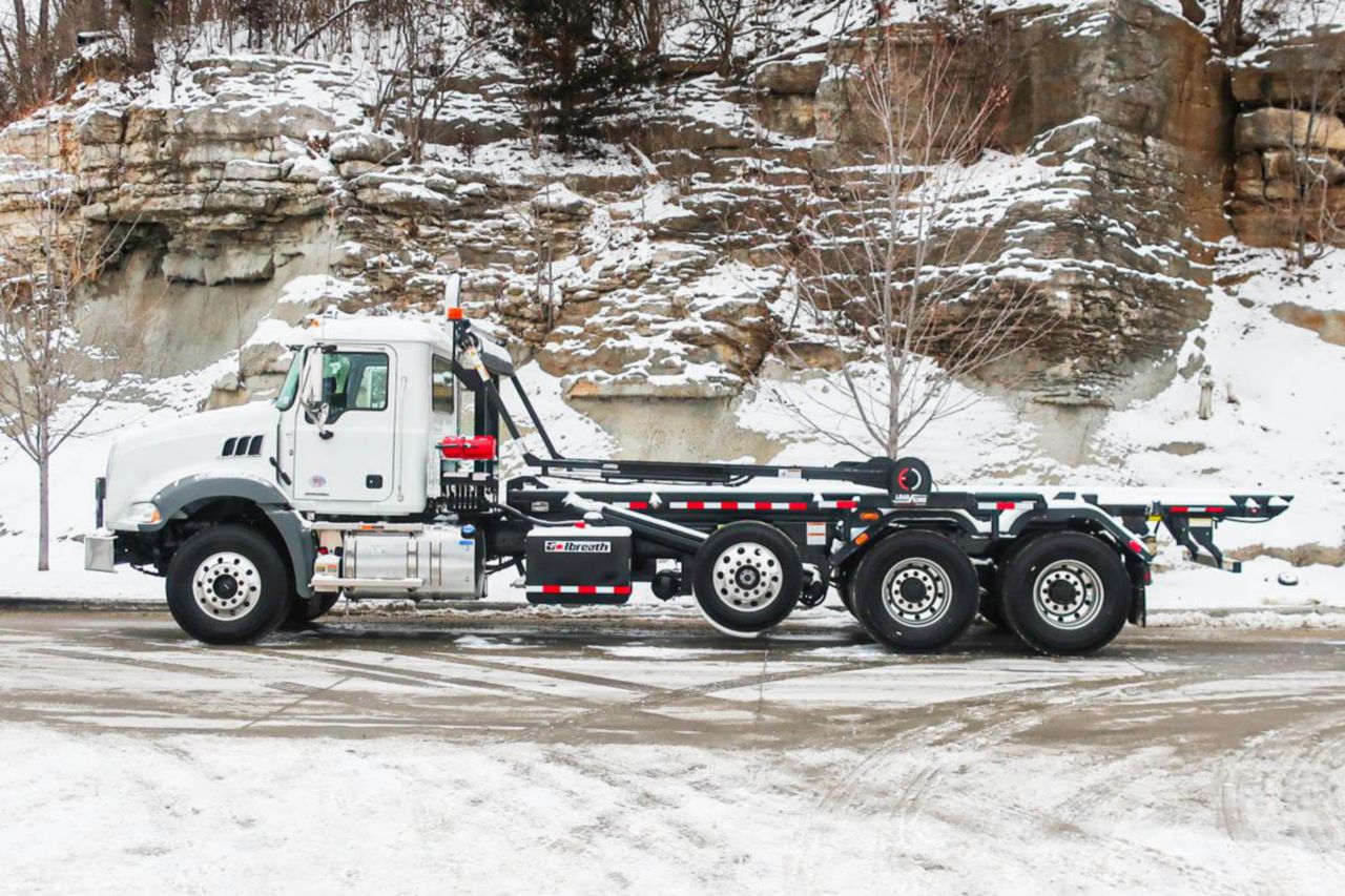 60,000 lbs Roll-Off Truck Rental - Custom Truck One Source