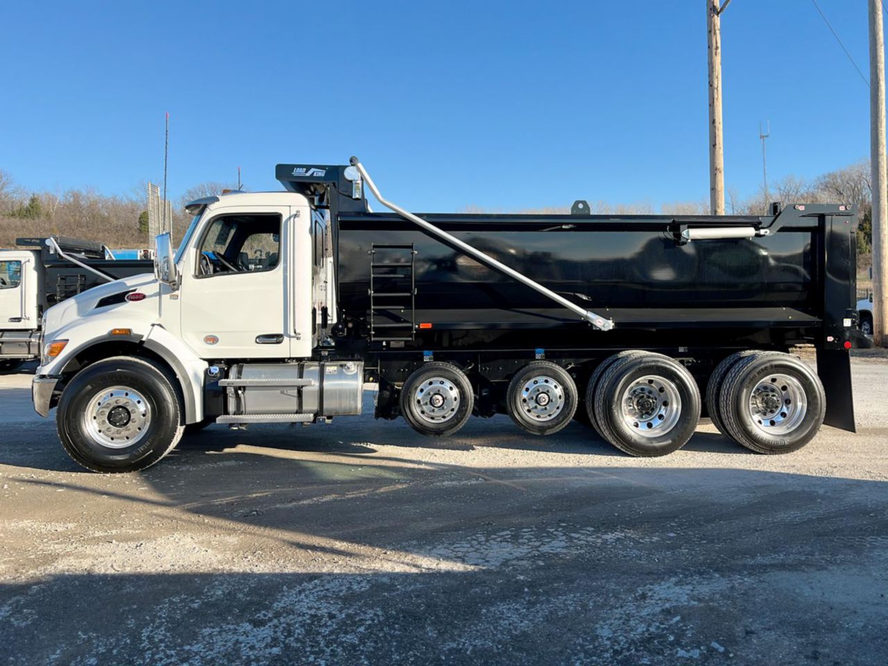 2026 Peterbilt 548 10x4 18' Load King Dump Truck