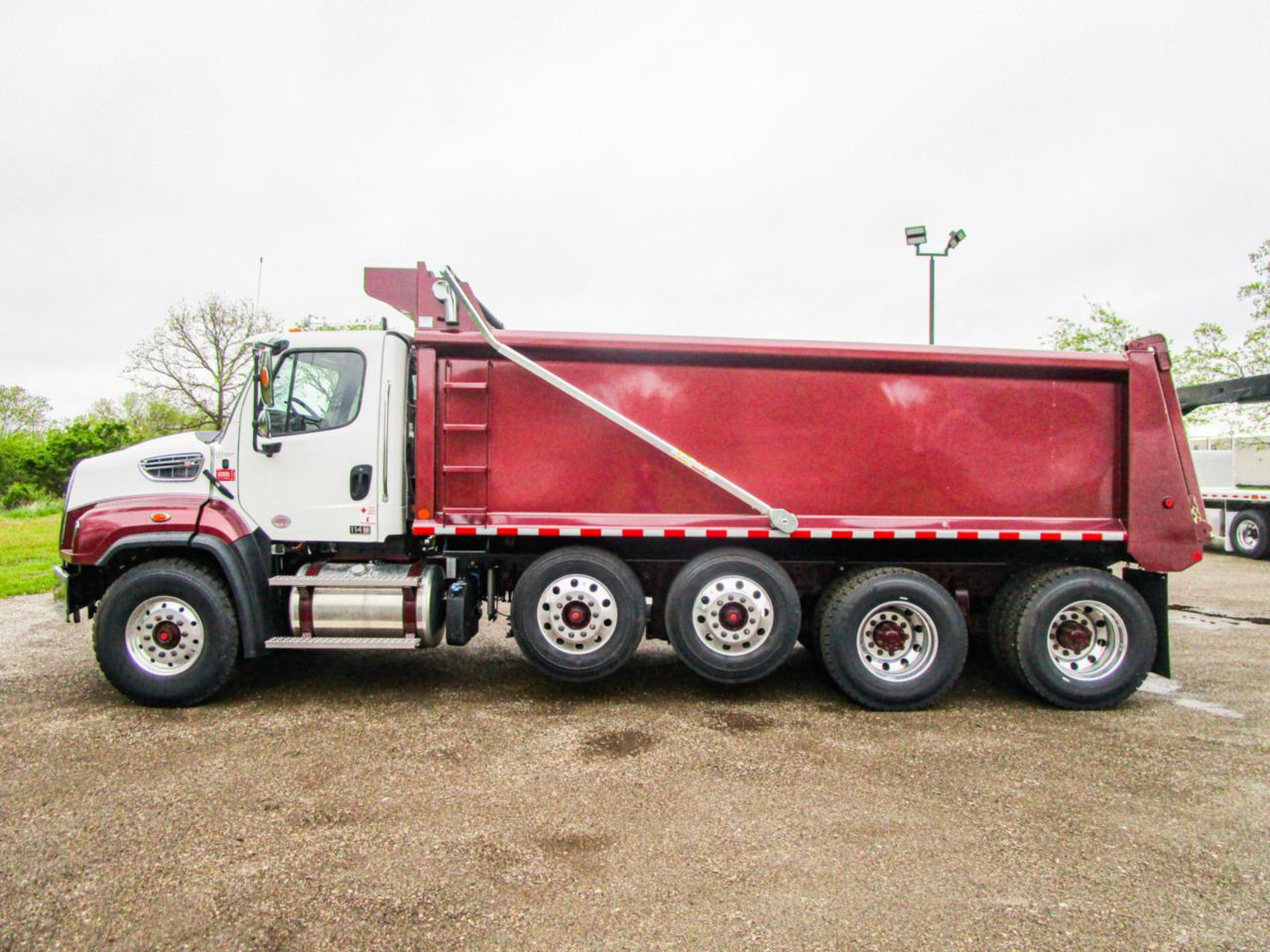 Quad Axle Dump Truck Rental - Custom Truck One Source