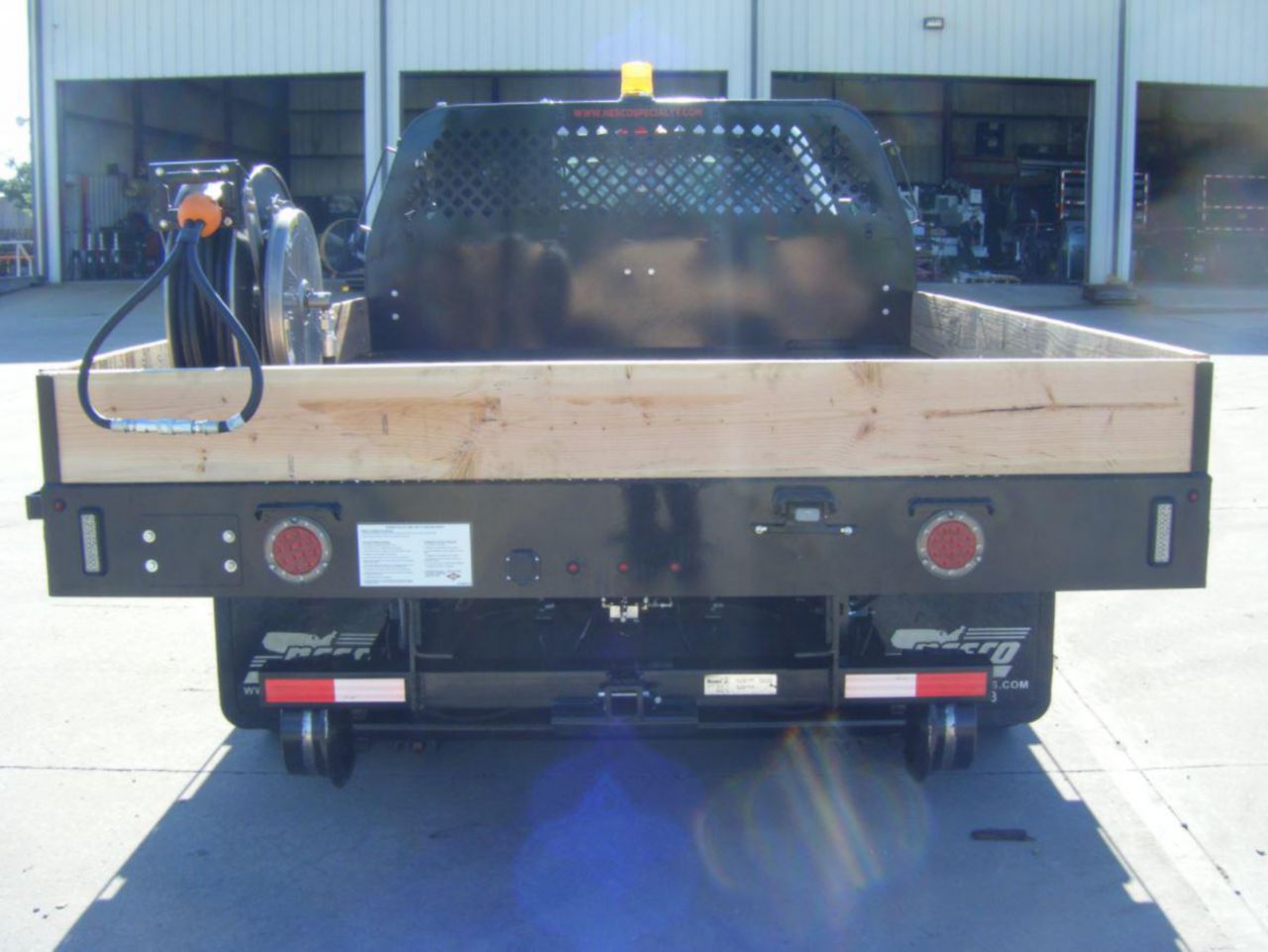 Medium-Duty Hi-Rail Flatbed Truck Rental - Custom Truck One Source