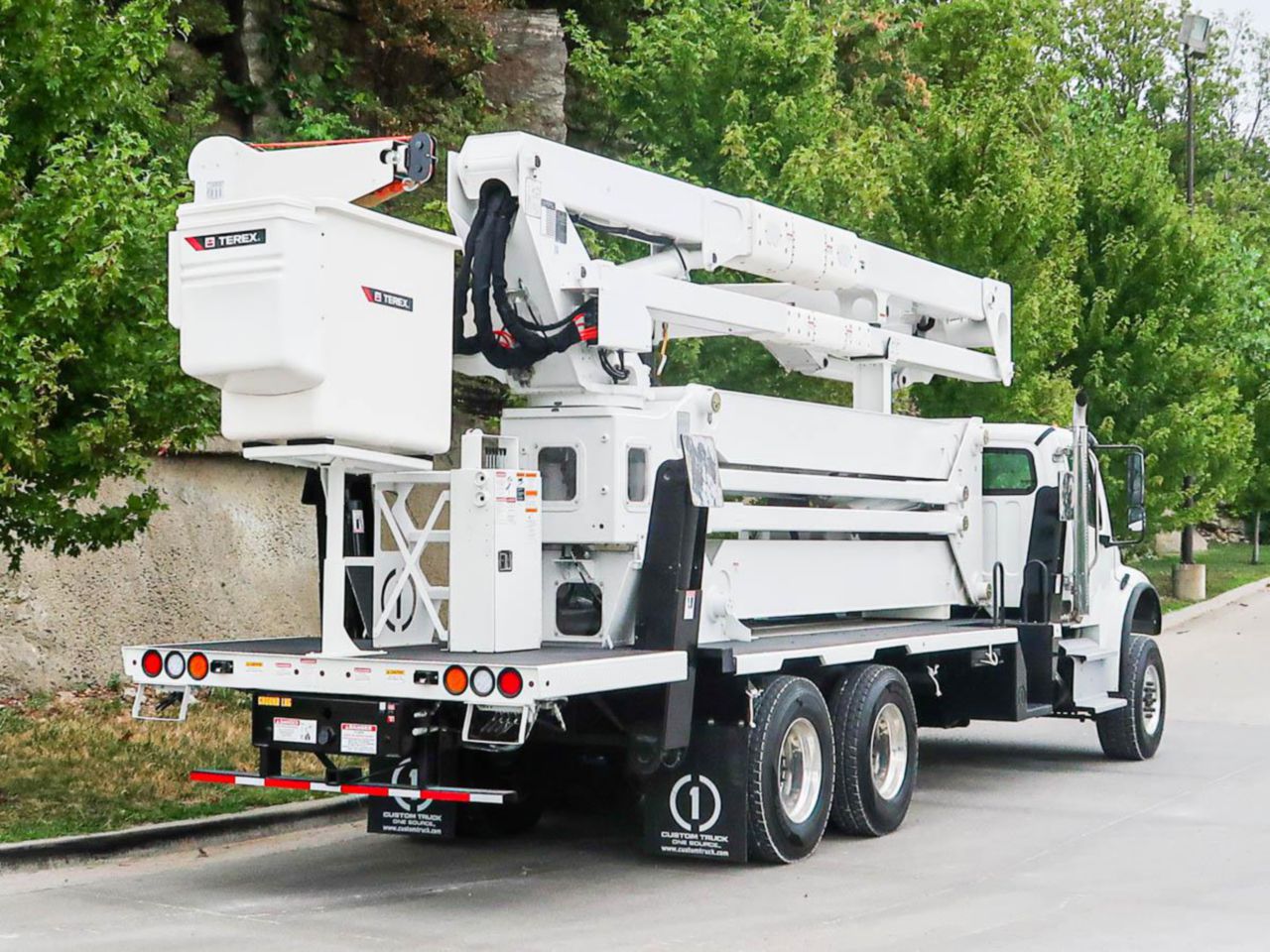 107 ft Transmission Bucket Truck Rental - Custom Truck One Source
