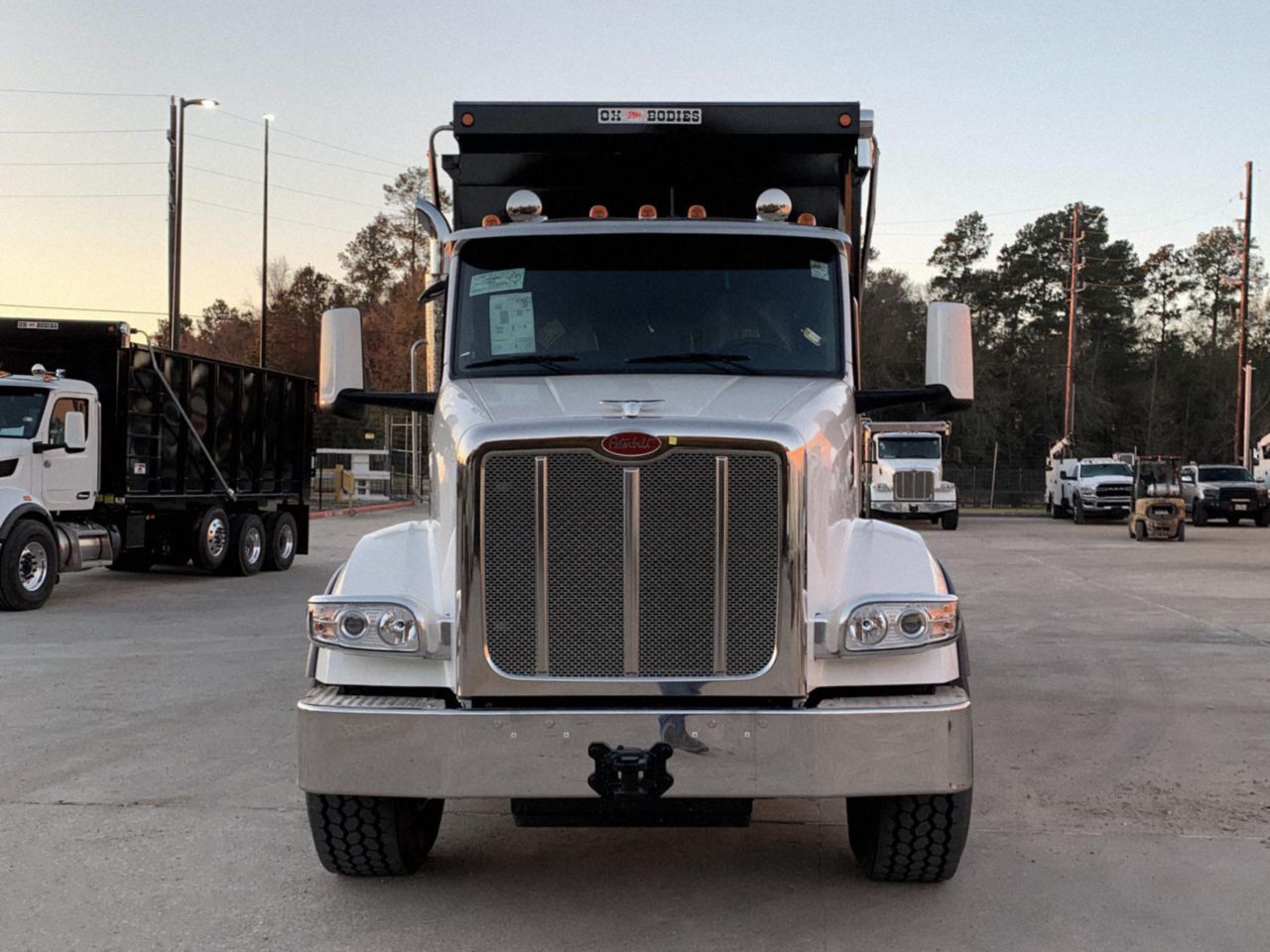 2023 Peterbilt 567 8x4 22' Ox Bodies Dump Truck
