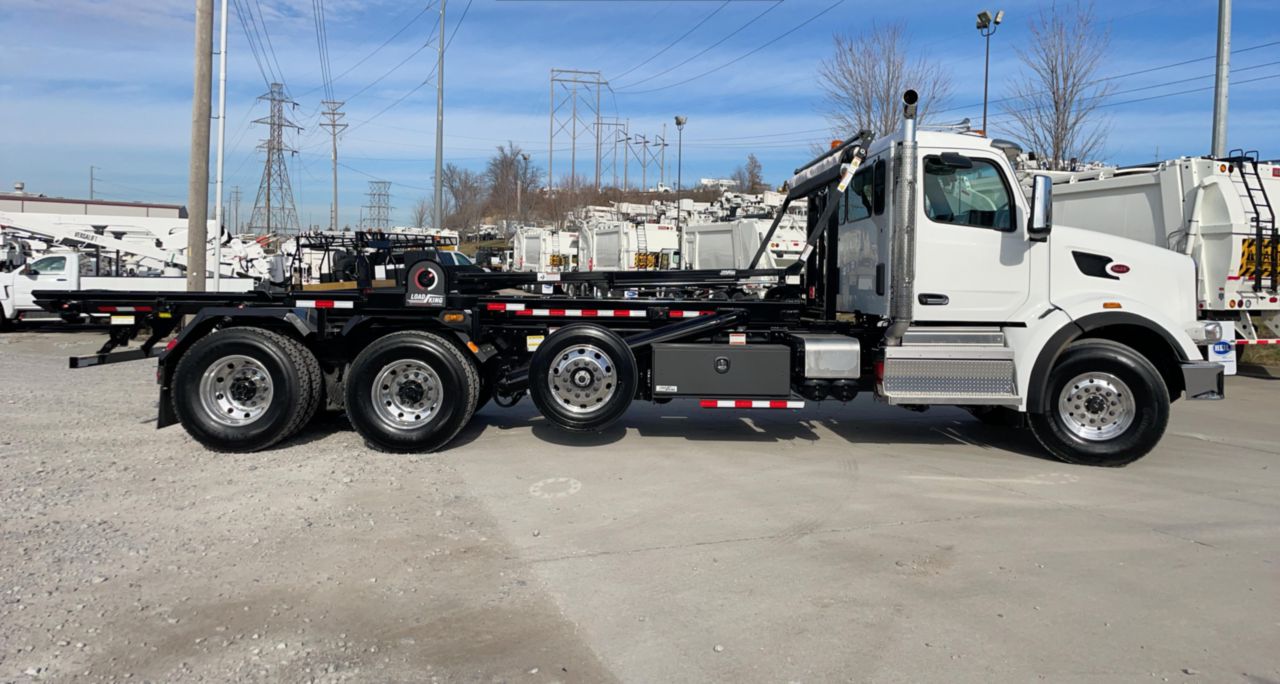 60,000 lbs Roll-Off Truck Rental - Custom Truck One Source