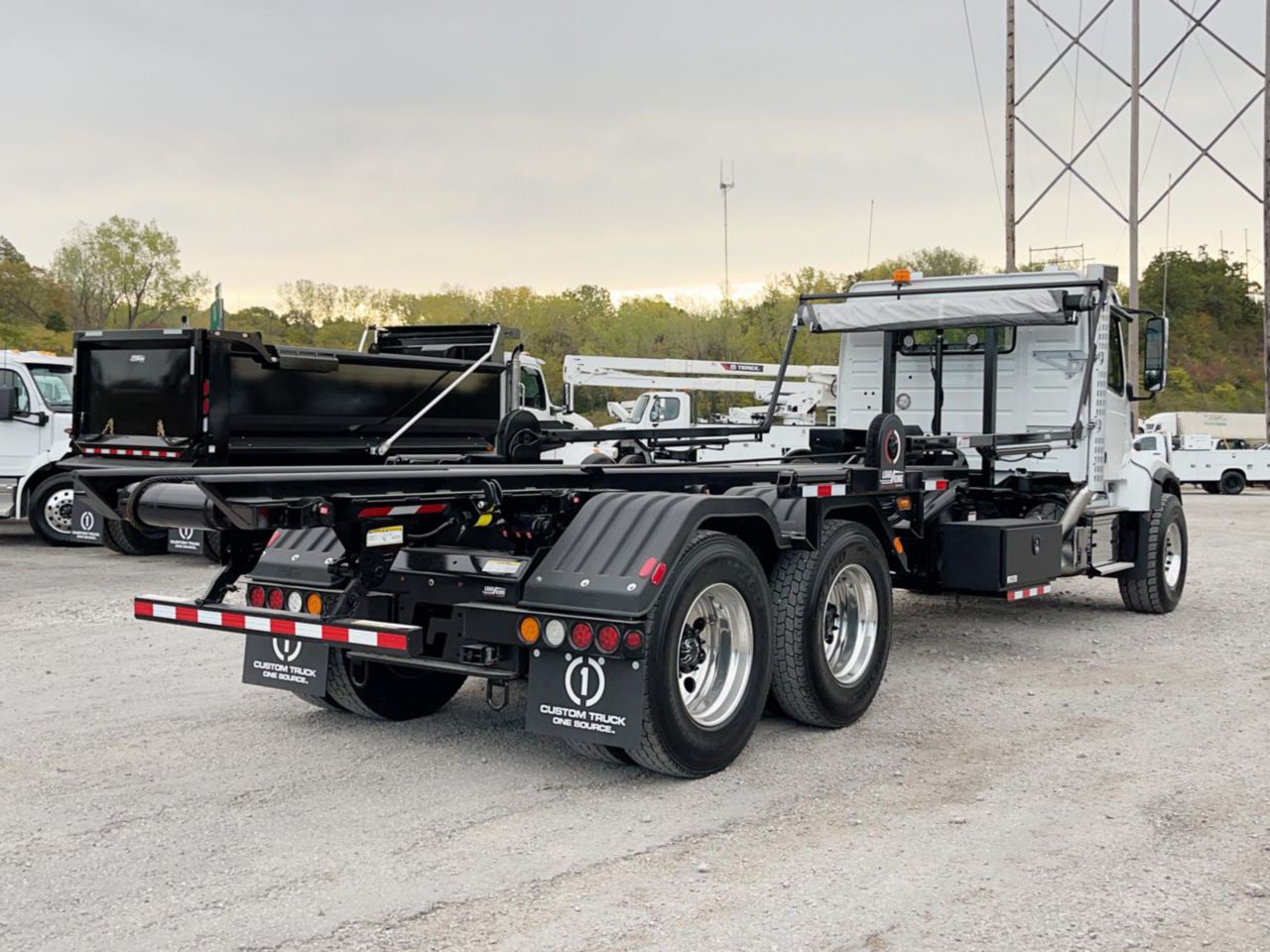 60,000 lbs Roll-Off Truck Rental - Custom Truck One Source